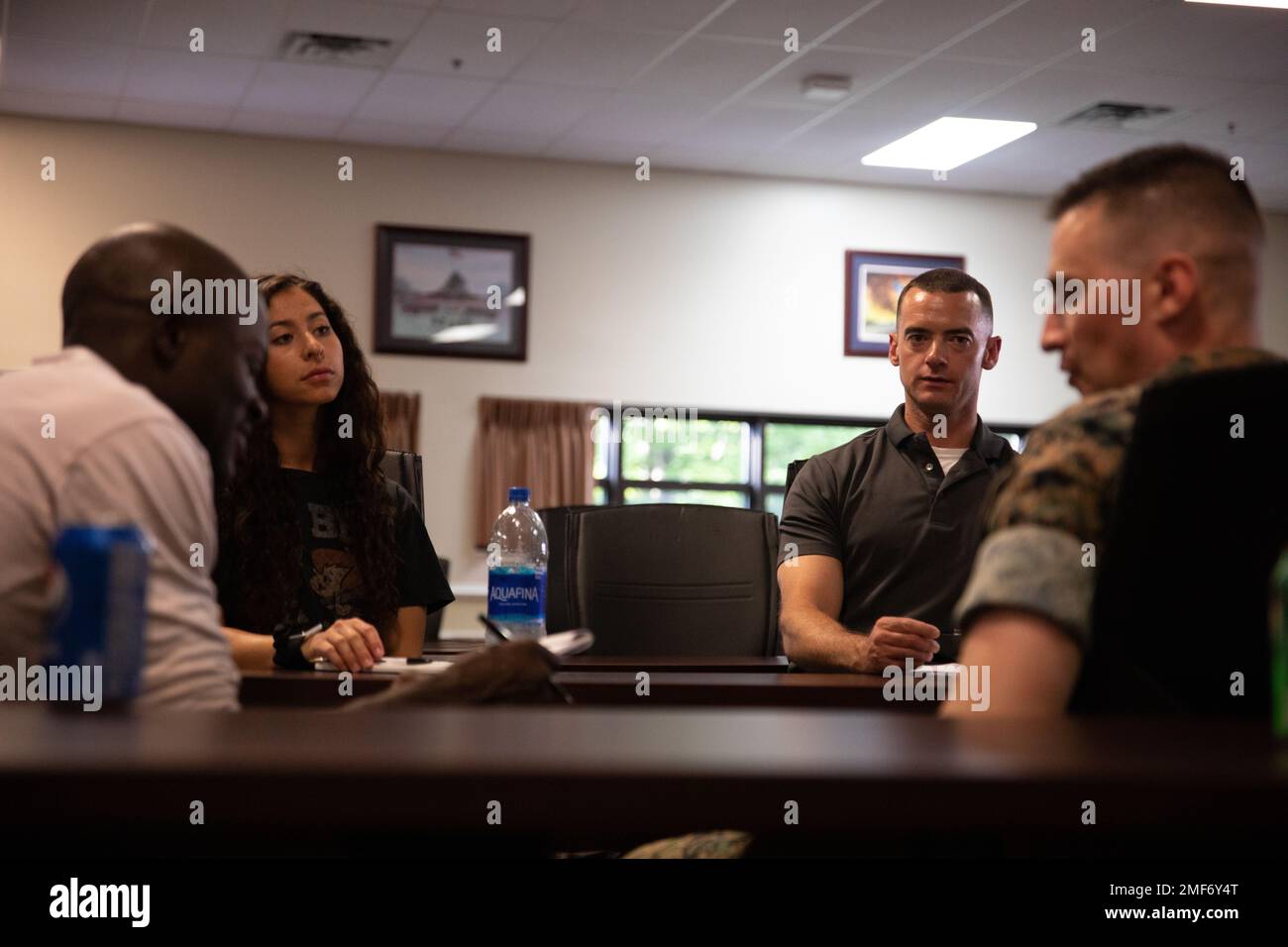 U.S. Marines participate in a mentorship session during the Marine ...