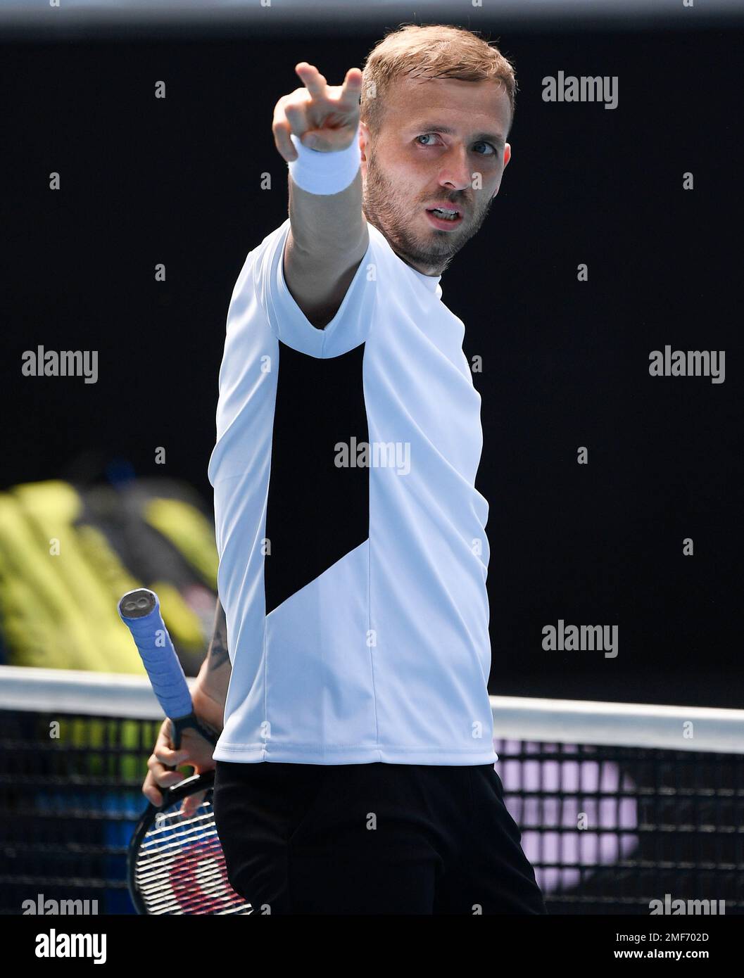 Britain's Daniel Evans celebrates after defeating Canada's Felix Auger ...