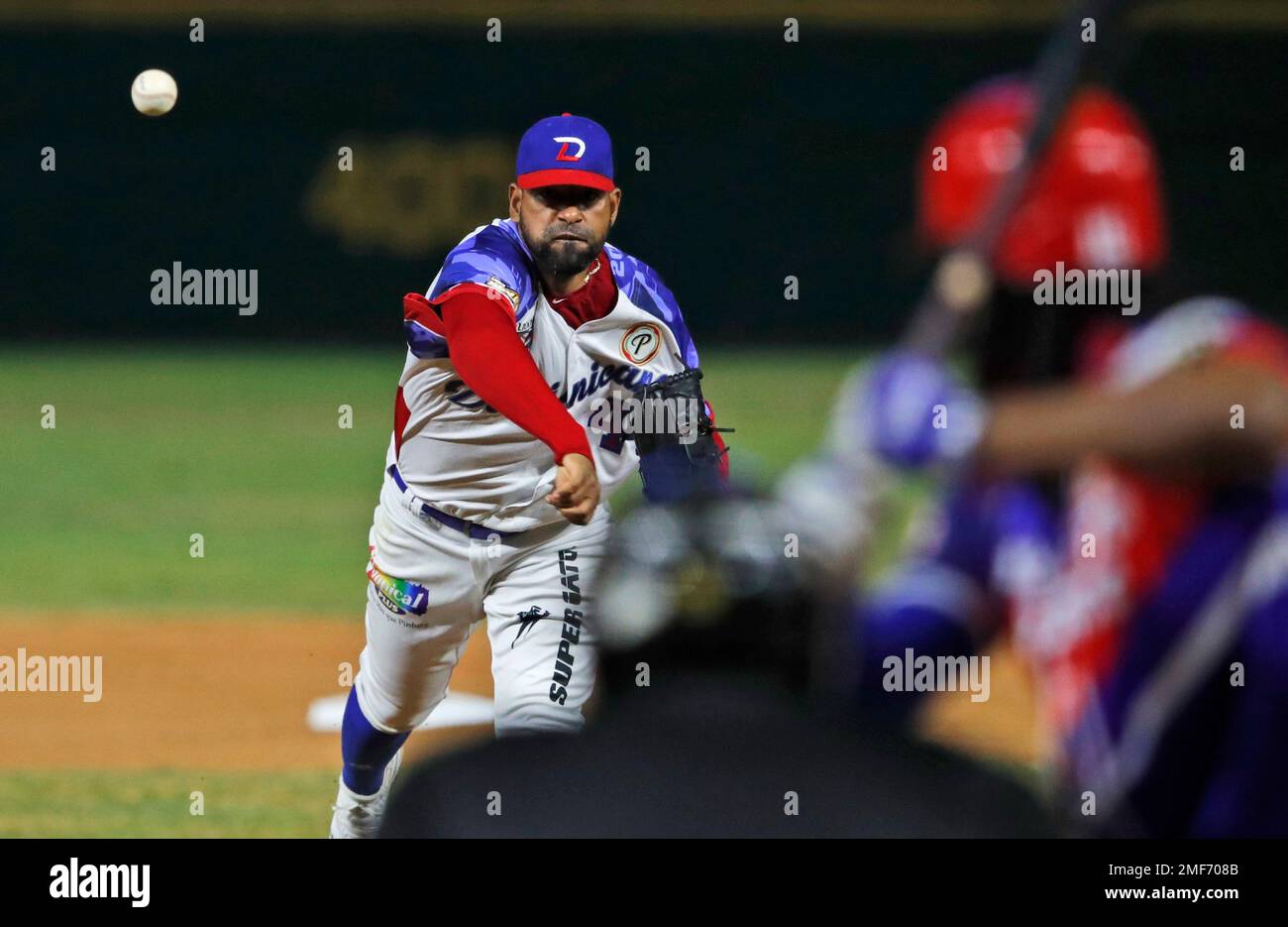 Dominican Republic starting pitcher Cesar Valdez throw to a Puerto Rico ...