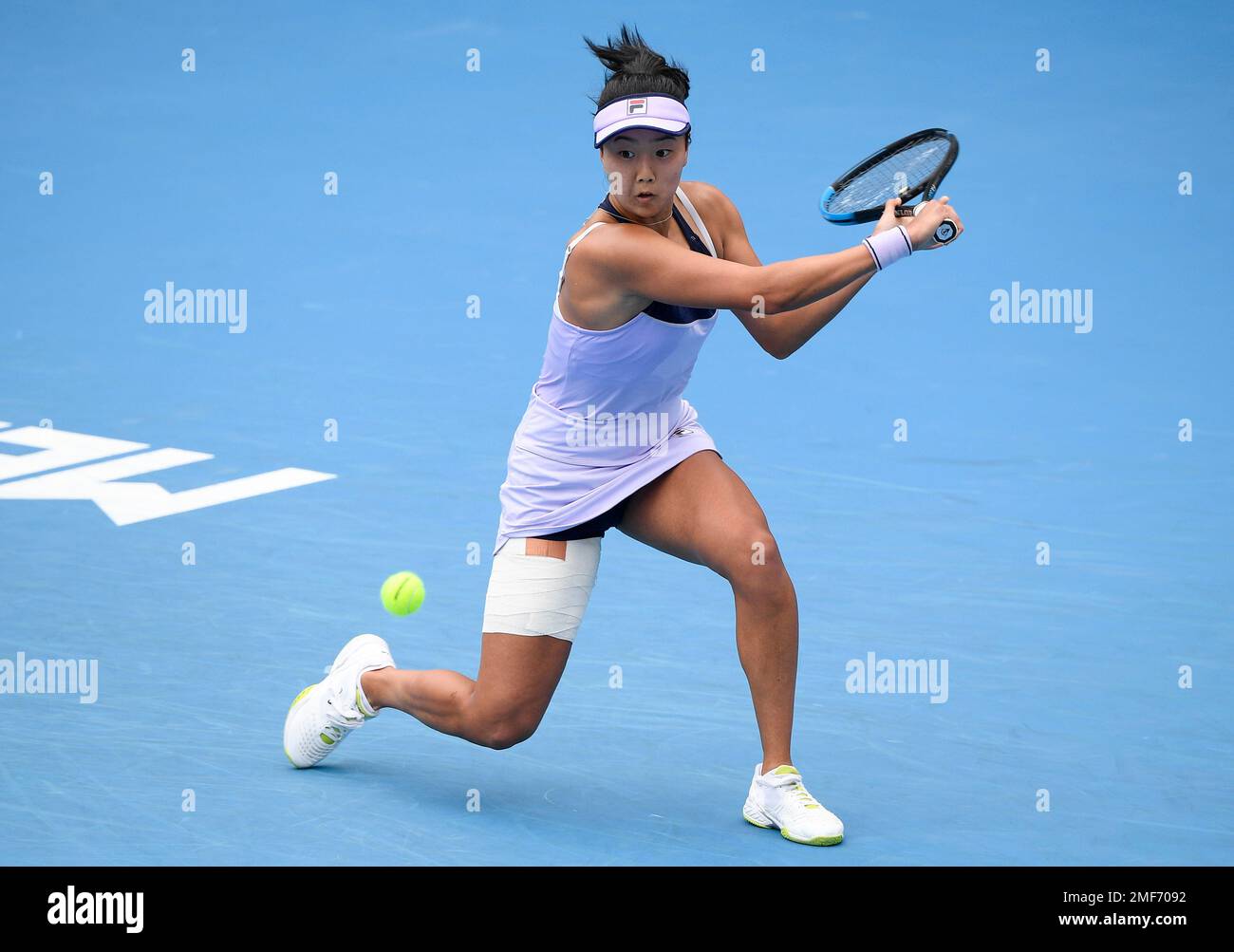 United States' Anne Li makes a backhand return to compatriot Jennifer ...
