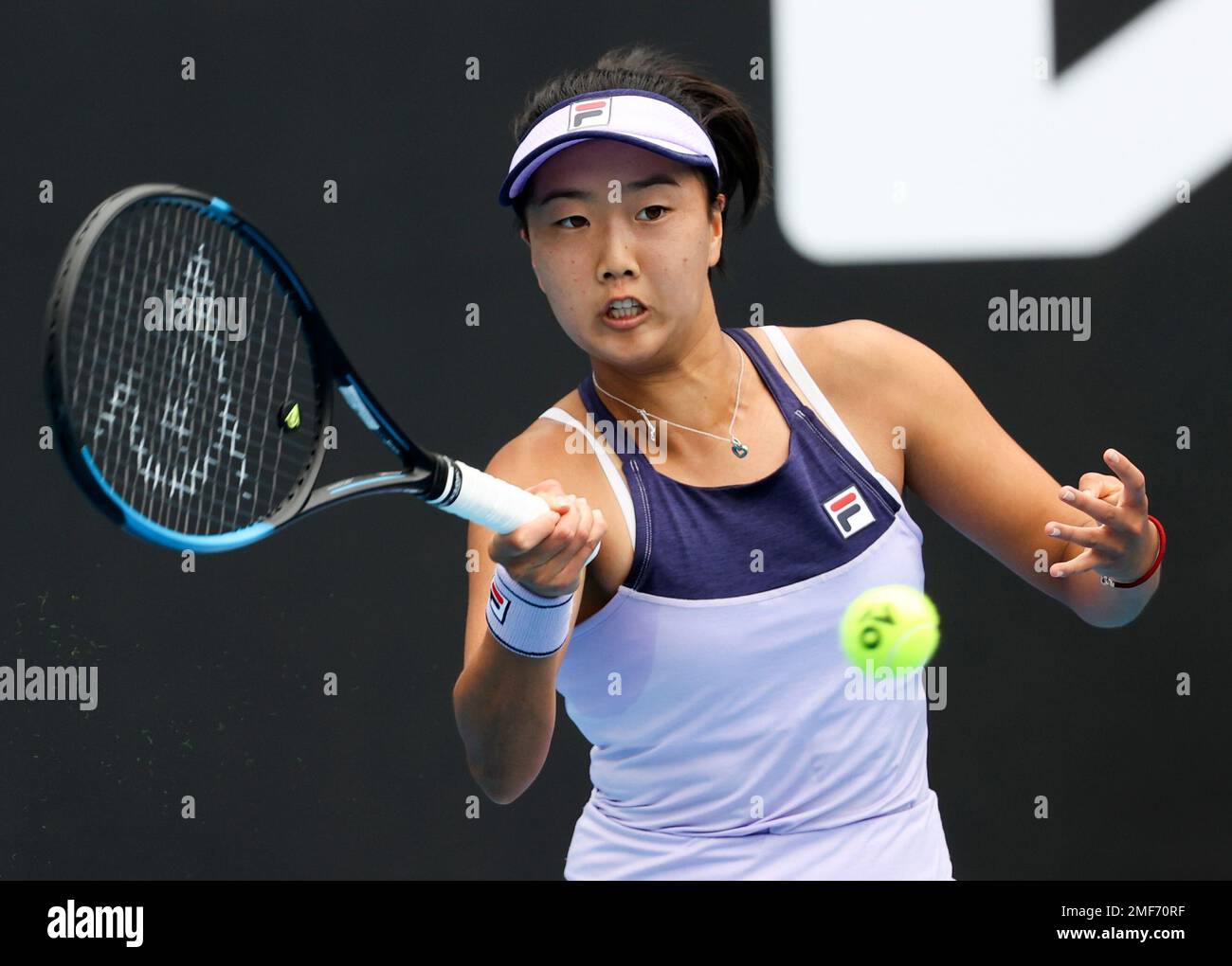 United States' Anne Li makes a forehand return to compatriot Jennifer ...
