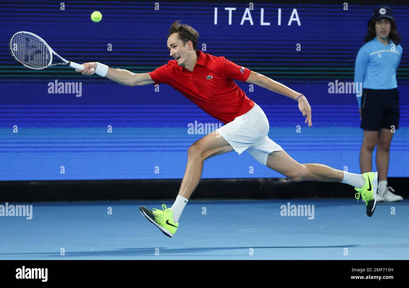 Russia's Daniil Medvedev makes a forehand return to Italy's Matteo ...