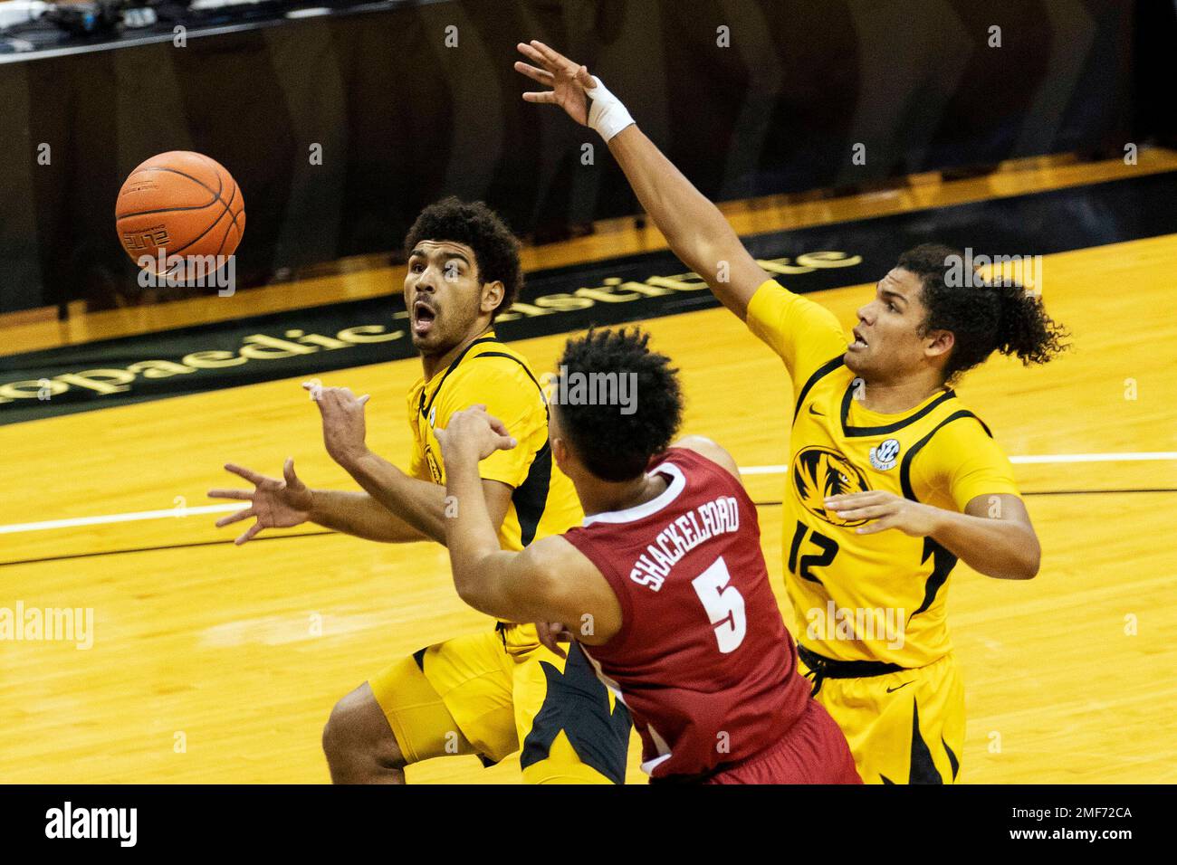 Alabama's Jaden Shackelford, center, Mark Smith, left, and Dru Smith ...
