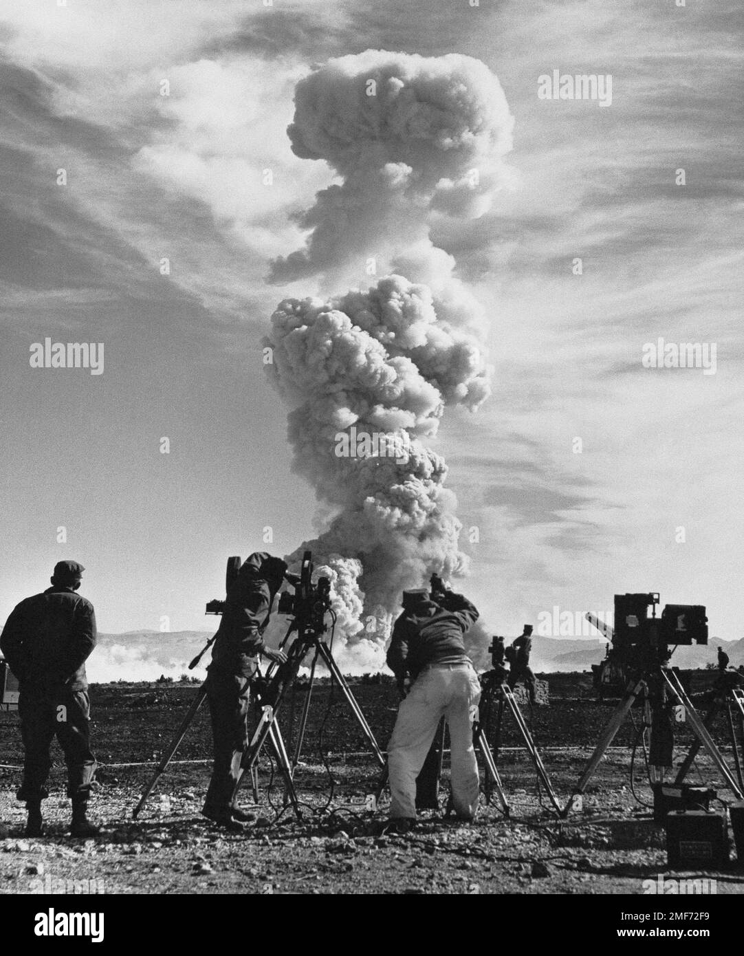FILE - In this June 1953, file photo, film crews photograph an atom ...