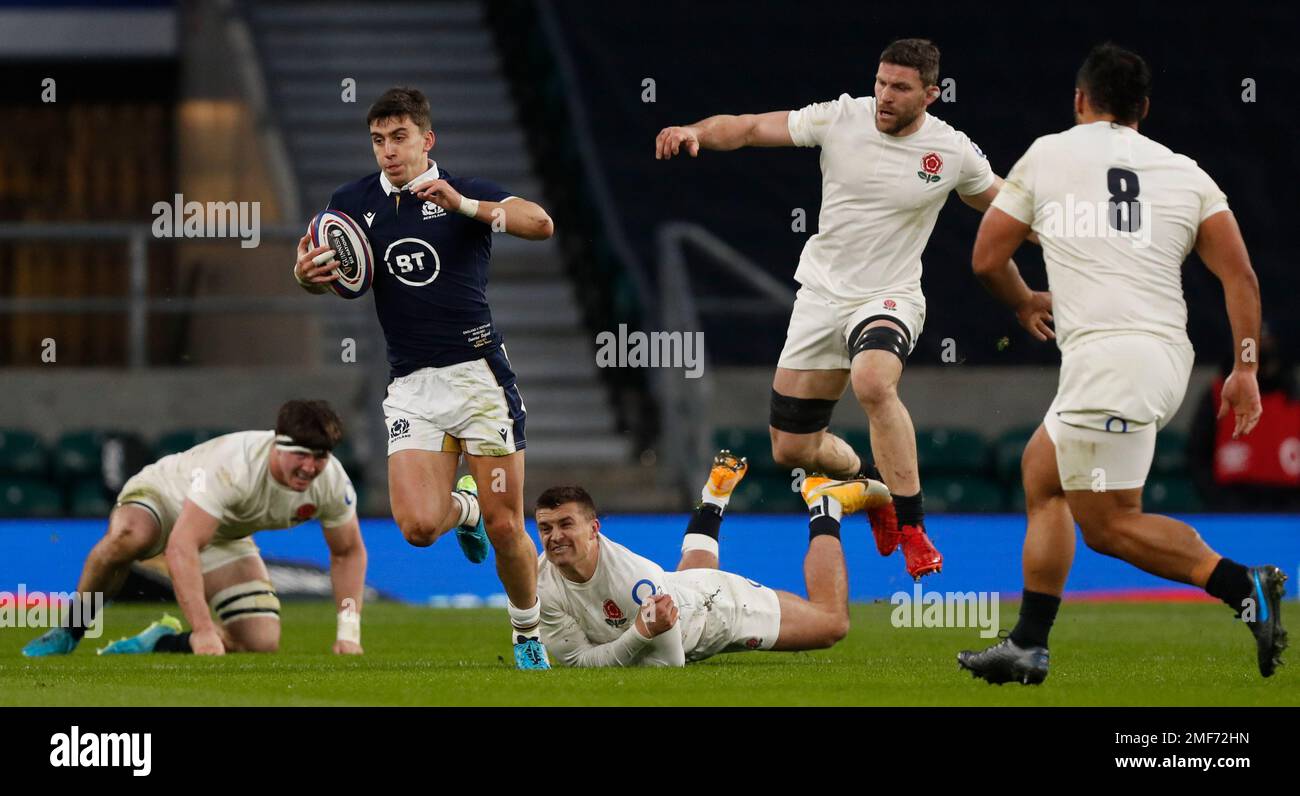 Scotland's Cameron Redpath breaks the tackle during the Six Nations ...