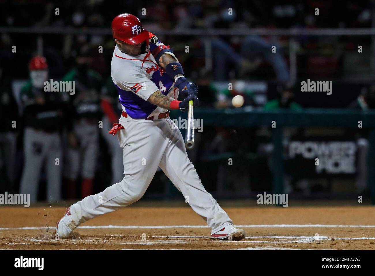 Puerto Rico's Yadier Molina bats against Mexico during the first inning ...