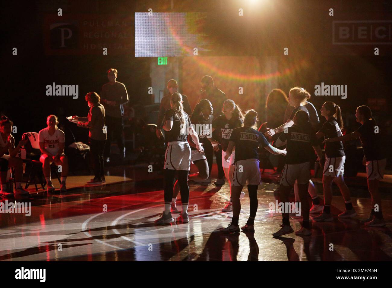 Washington State players are introduced before an NCAA college ...