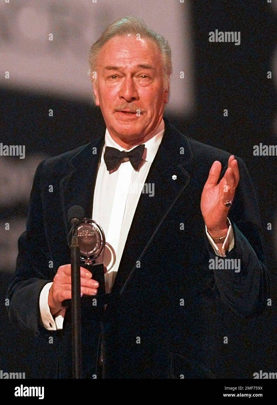 FILE - Christopher Plummer accepts his award for best leading actor in ...