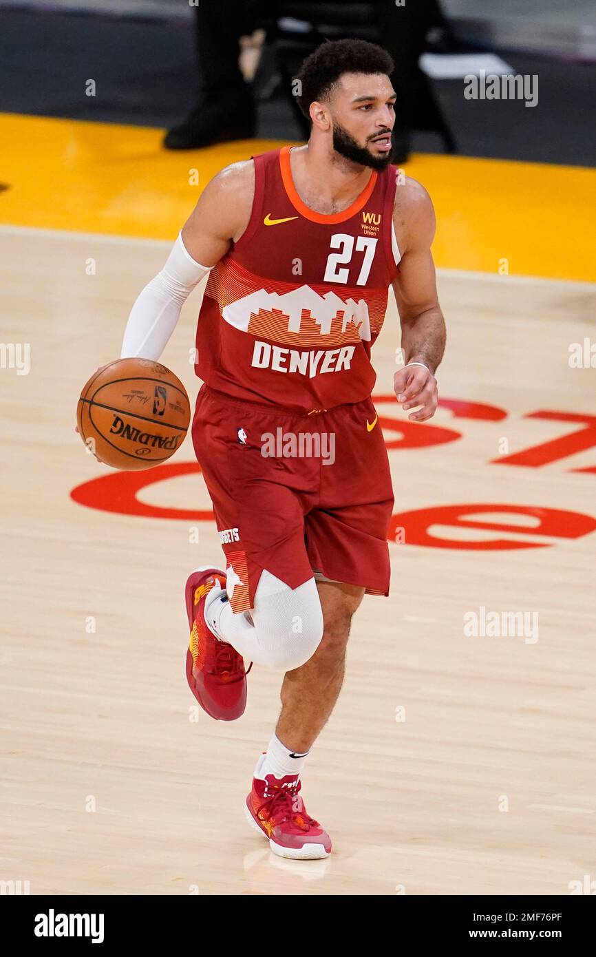 Denver Nuggets guard Jamal Murray (27) dribbles against the Los Angeles ...