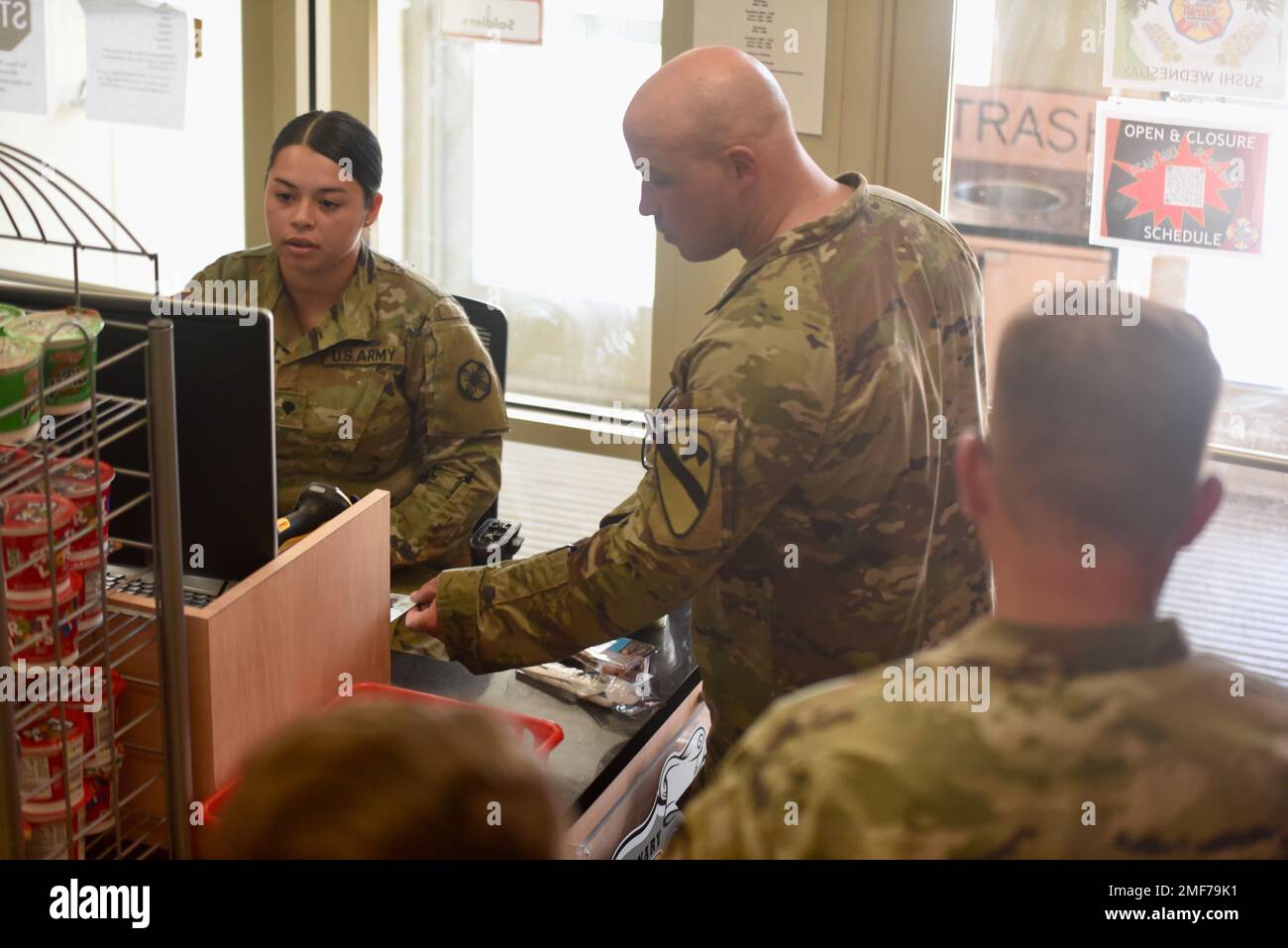 U.S. Army Soldiers purchase pre-packaged food at the Culinary Outpost ...