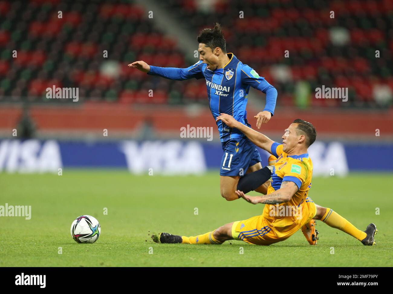 Jesus Duenas of Tigres UANL tackles Ulsan Hyundai's Lee Dongjun during FIFA Club World Cup in Al ...