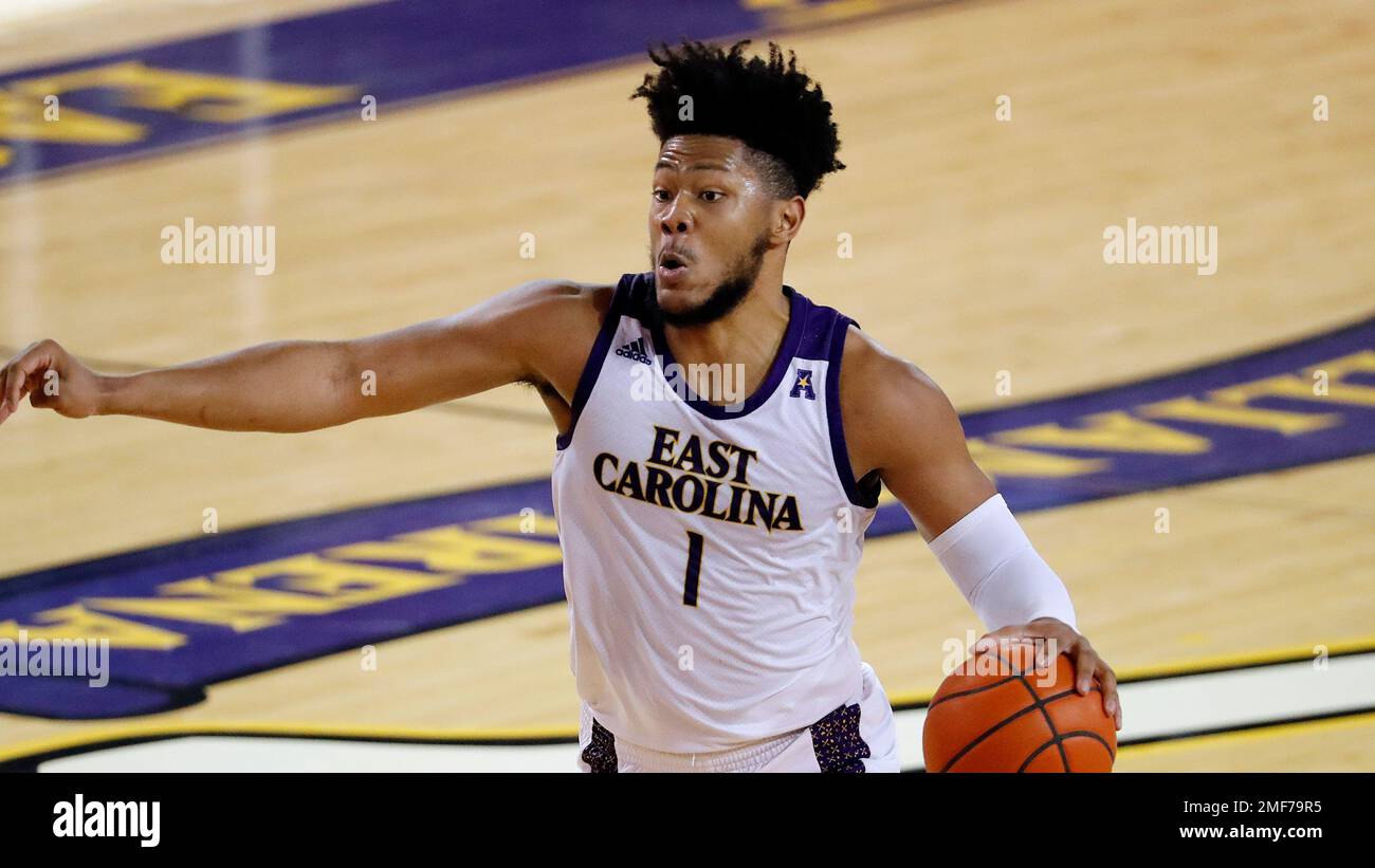 East Carolina's Jayden Gardner (1) drives the ball down the court ...