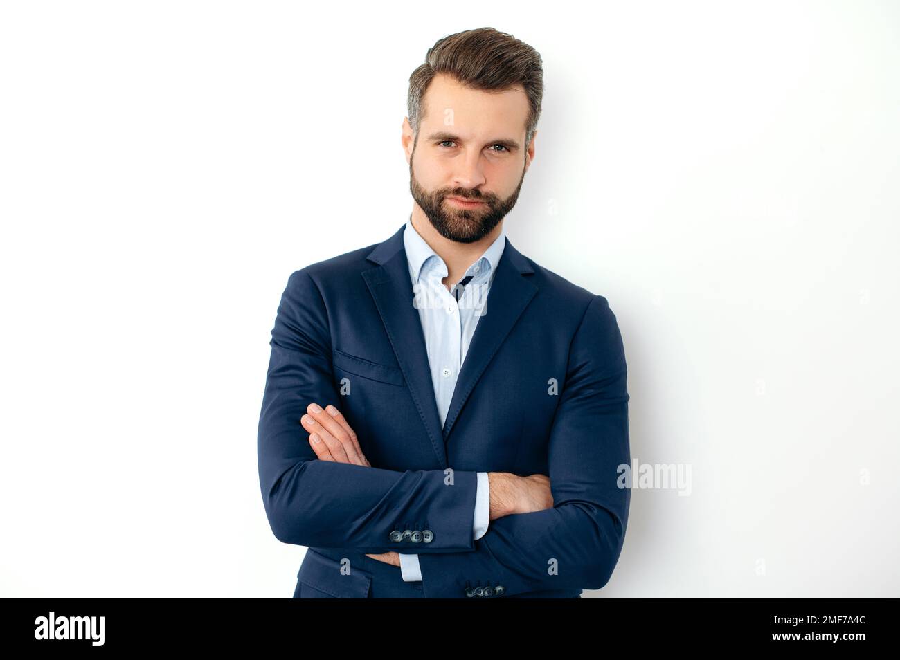 Photo of a handsome serious caucasian successful business man in a suit ...
