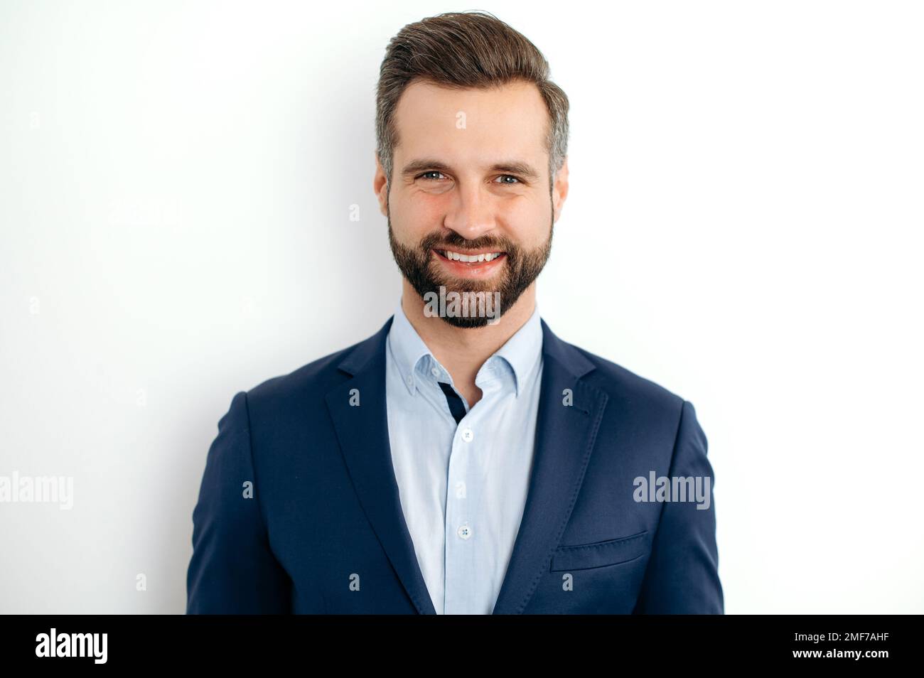 Close-up photo of a confident handsome bearded caucasian businessman ...