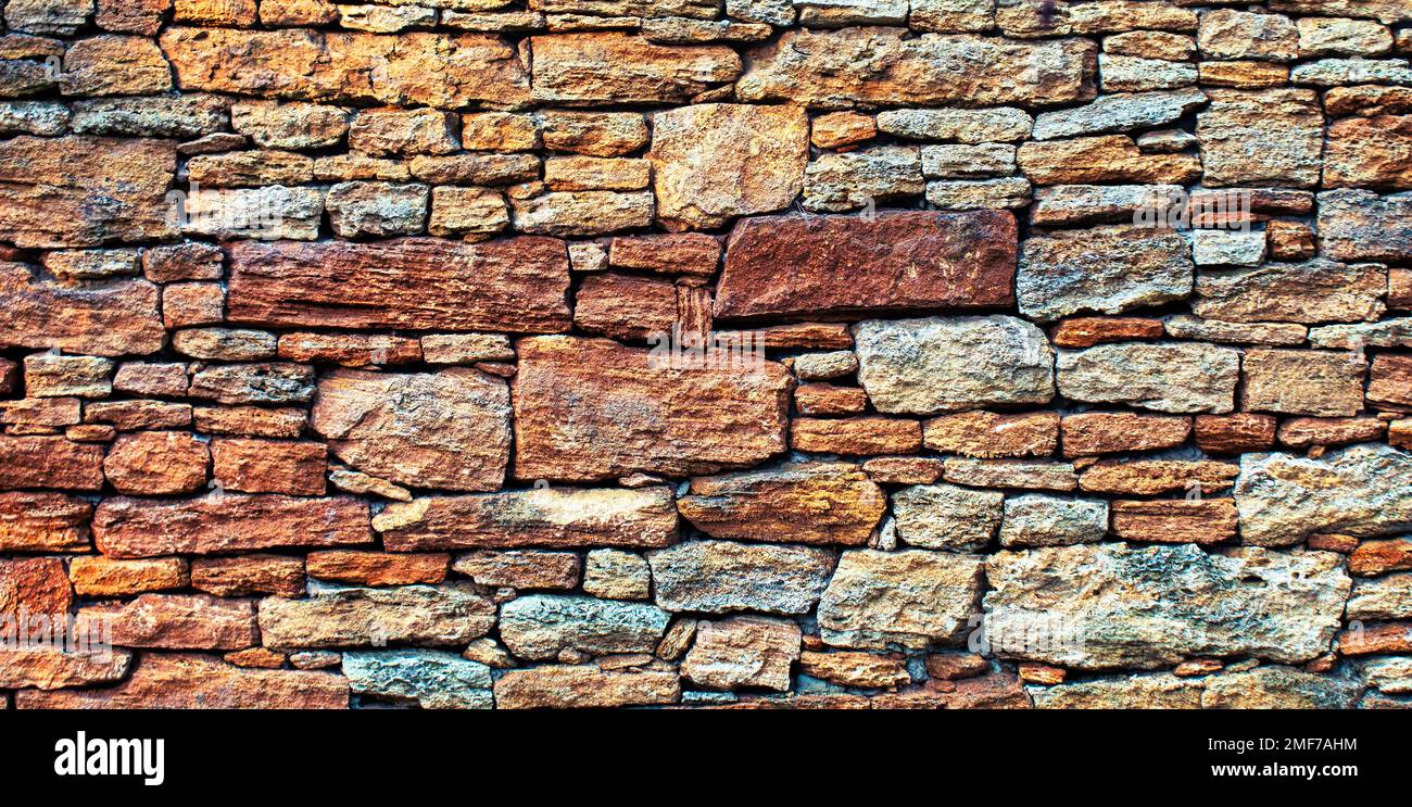 A wall made of natural stone, shell. Use of natural materials in ...