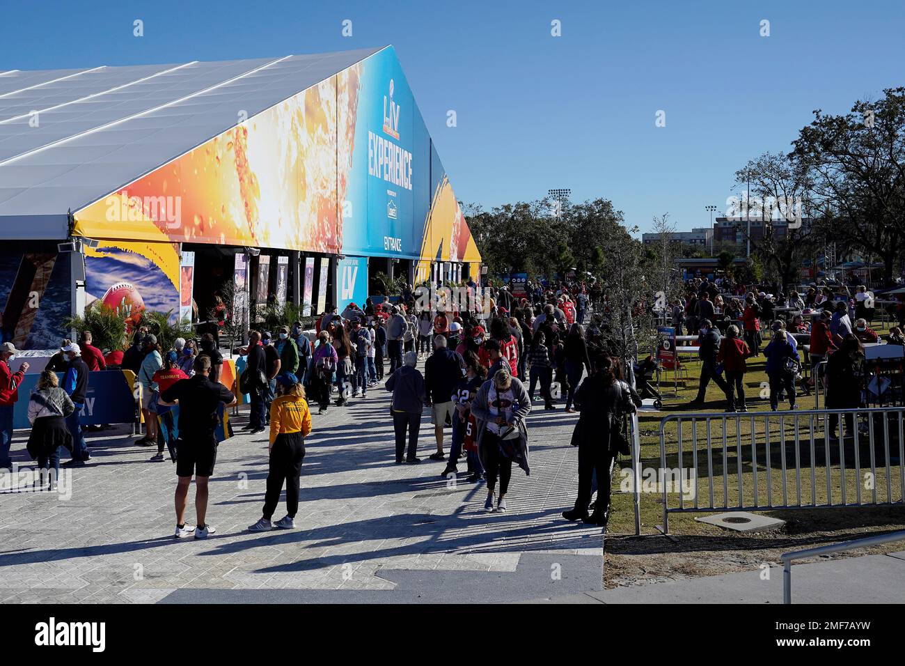 Fans walk through the Super Bowl Experience, Wednesday, Feb. 3, 2021 ...