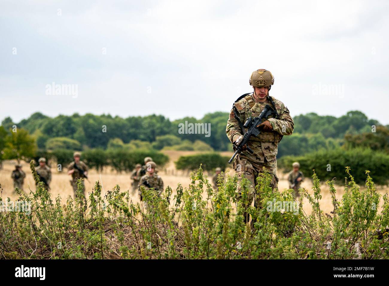 Airmen from the 423d Security Forces Squadron advance their position ...