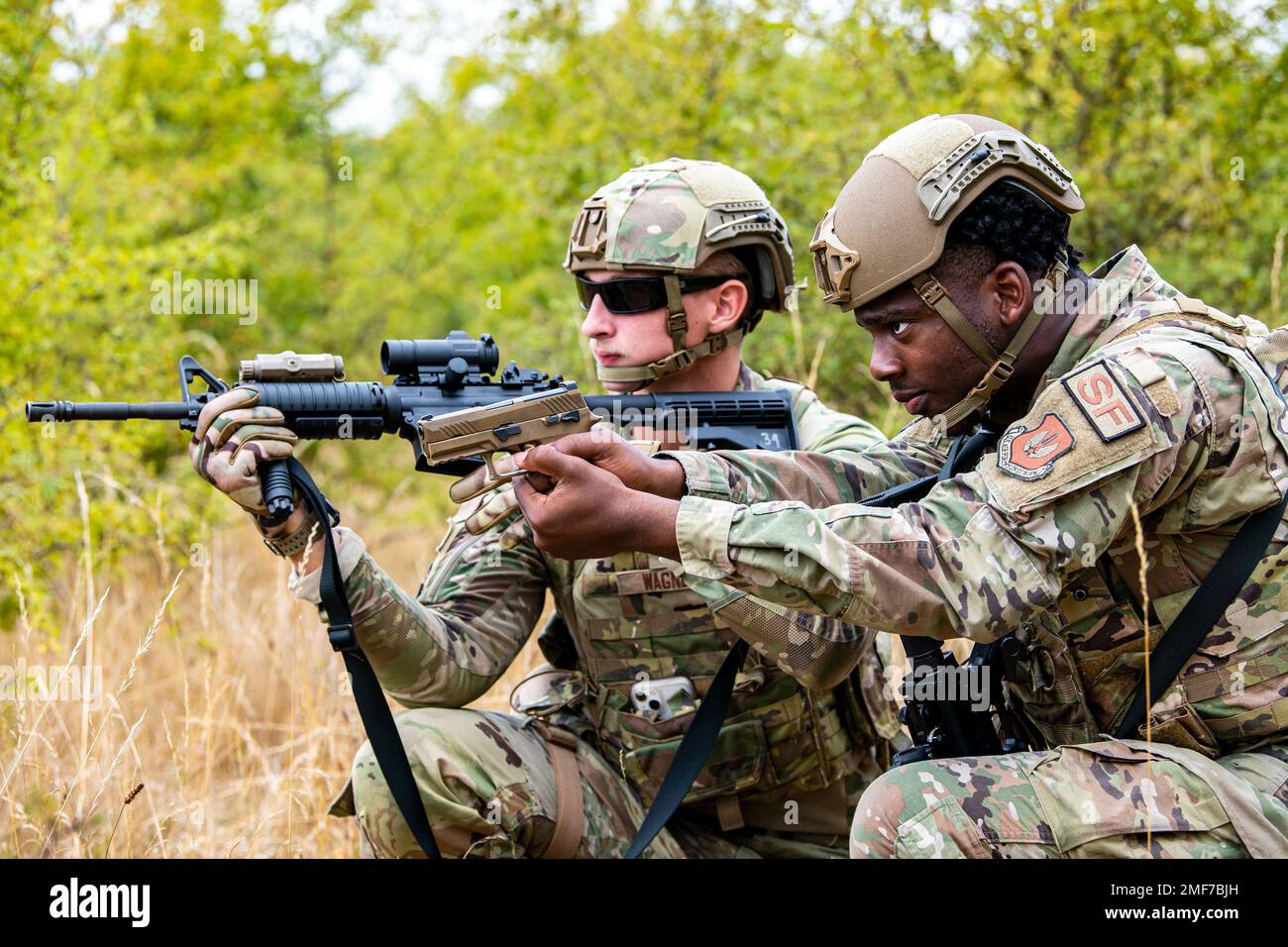 Airmen from the 423d Security Forces Squadron hold their position ...