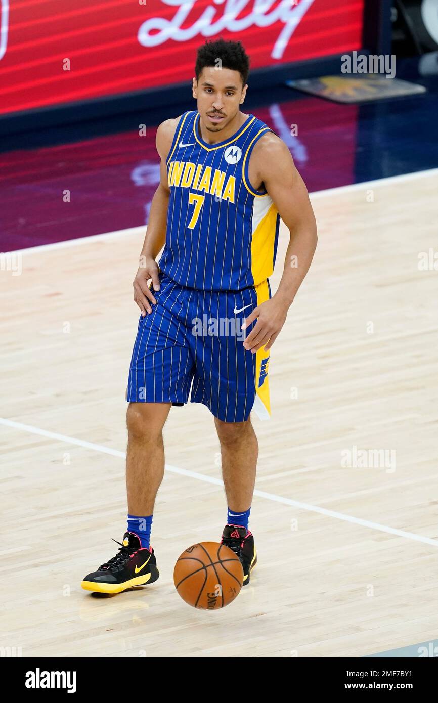 Indiana Pacers' Malcolm Brogdon (7) dribbles during the first half of ...