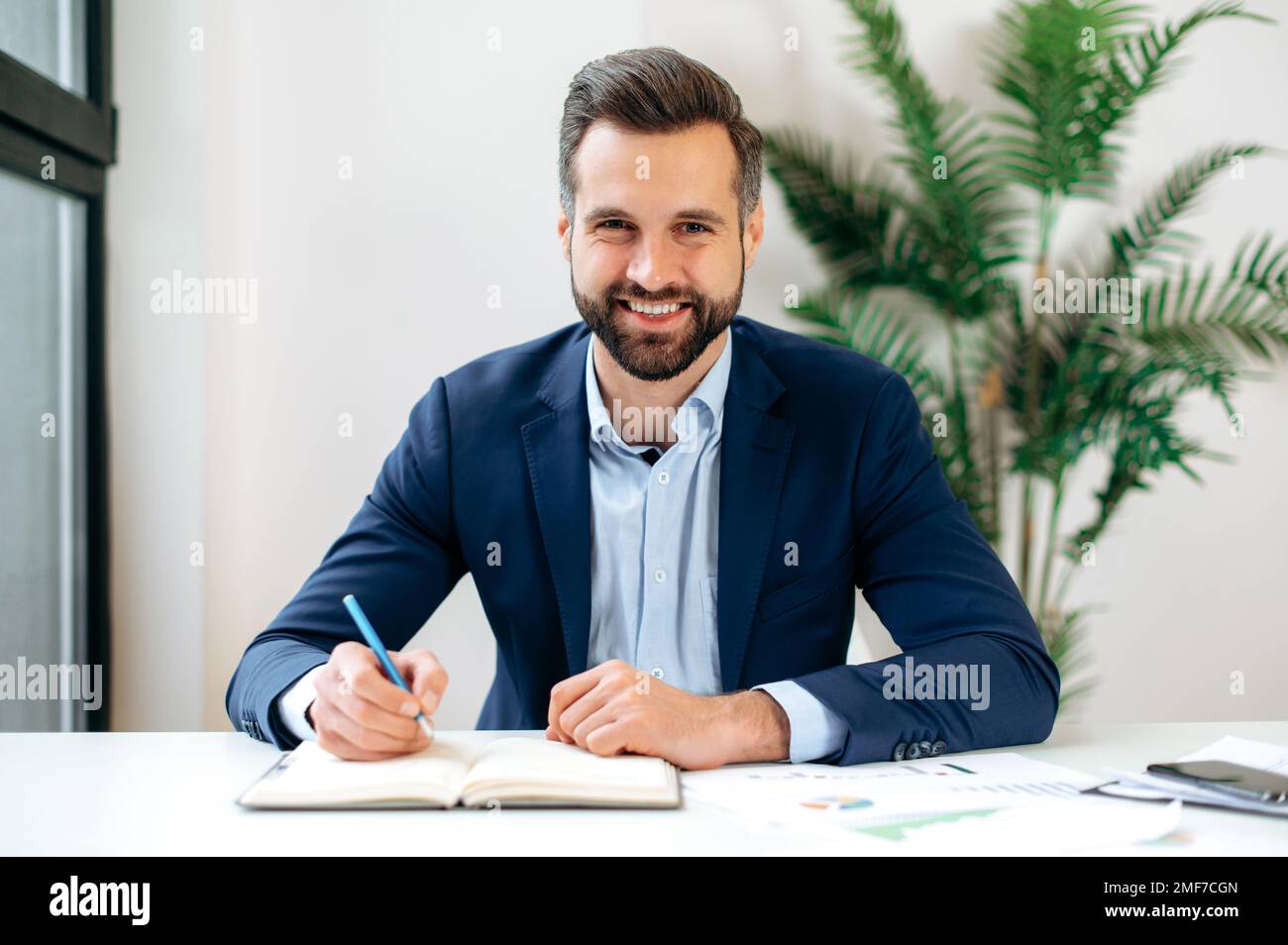 Positive attractive caucasian professional business man, mentor ...