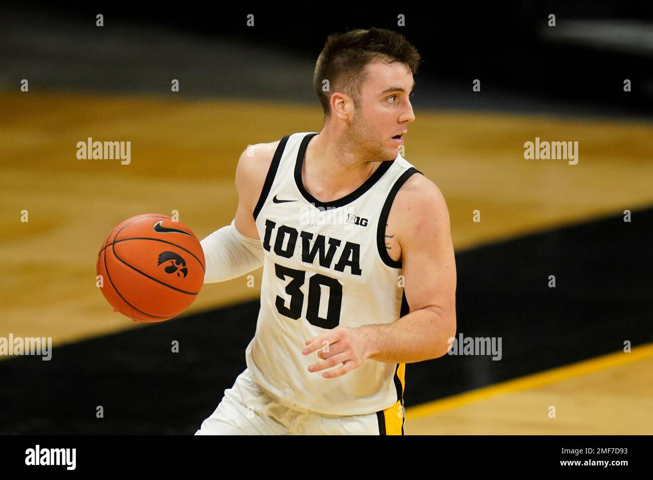 Iowa guard Connor McCaffery drives up court during the second half of ...