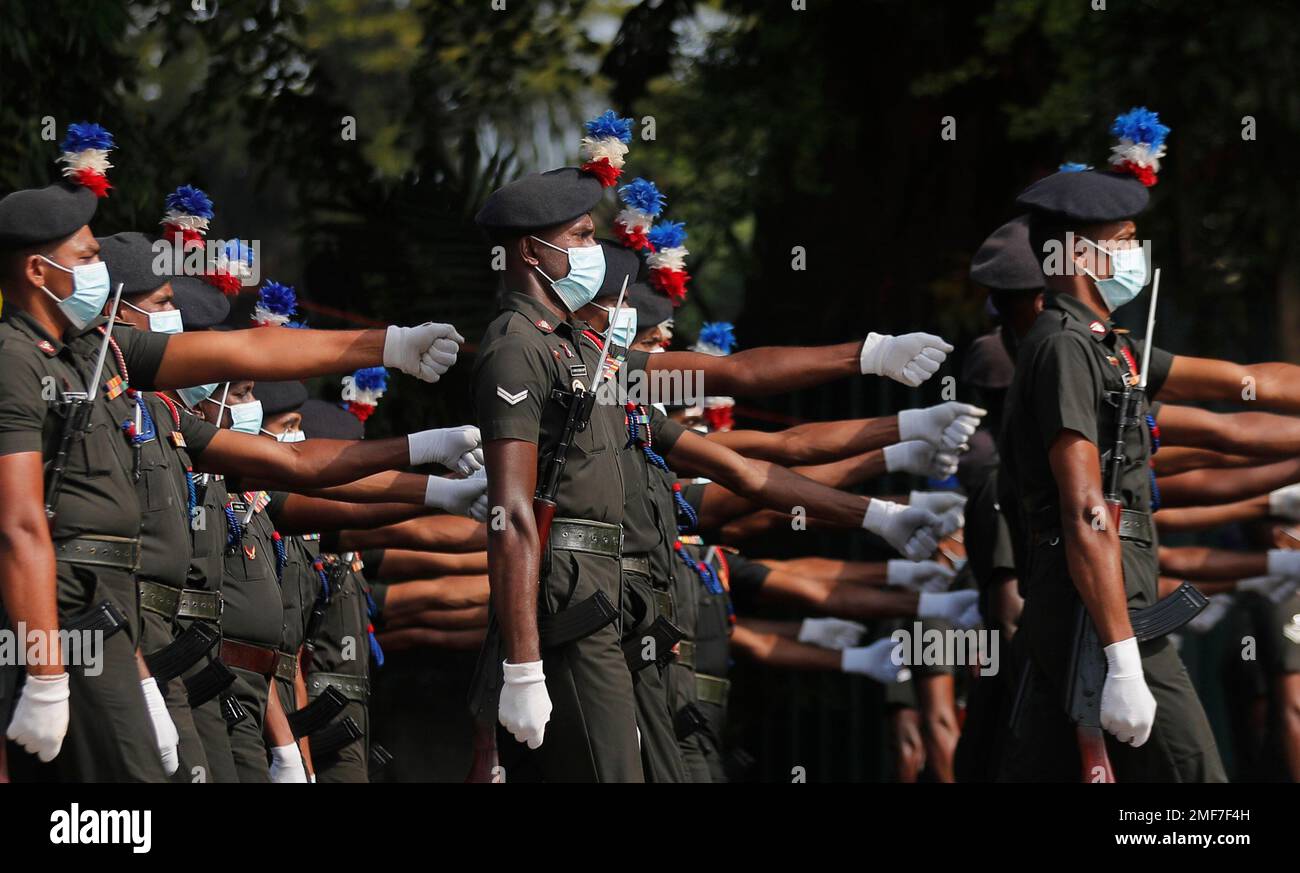 Sri Lankan army soldiers march during the 73rd Independence Day parade ...