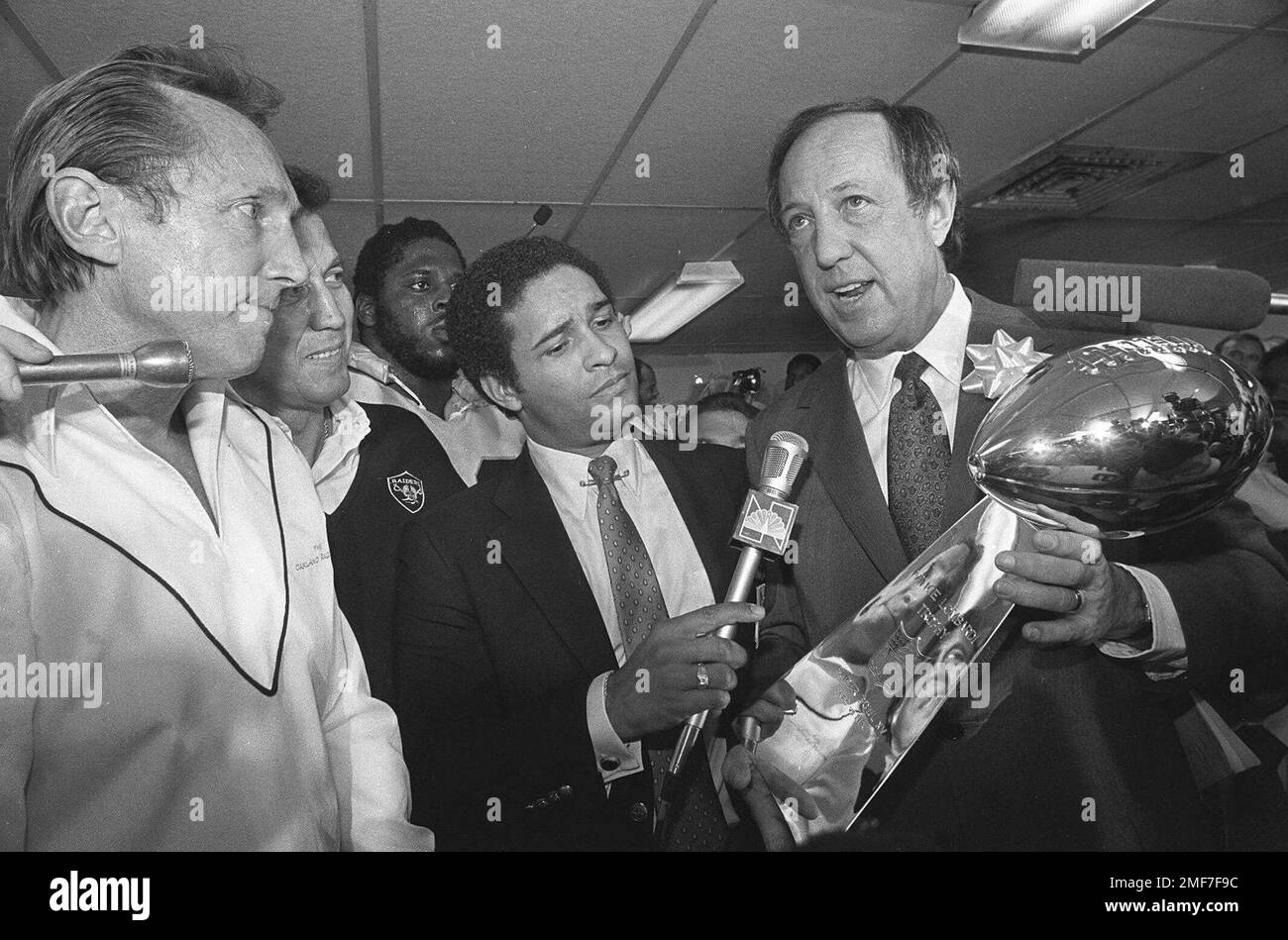 FILE - NFL Commissioner Pete Rozelle, right, presents the Super Bowl XV ...