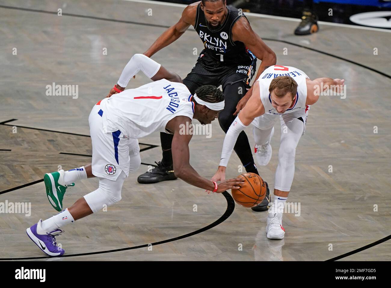 Brooklyn Nets forward Kevin Durant (7) watches after turning the ball ...