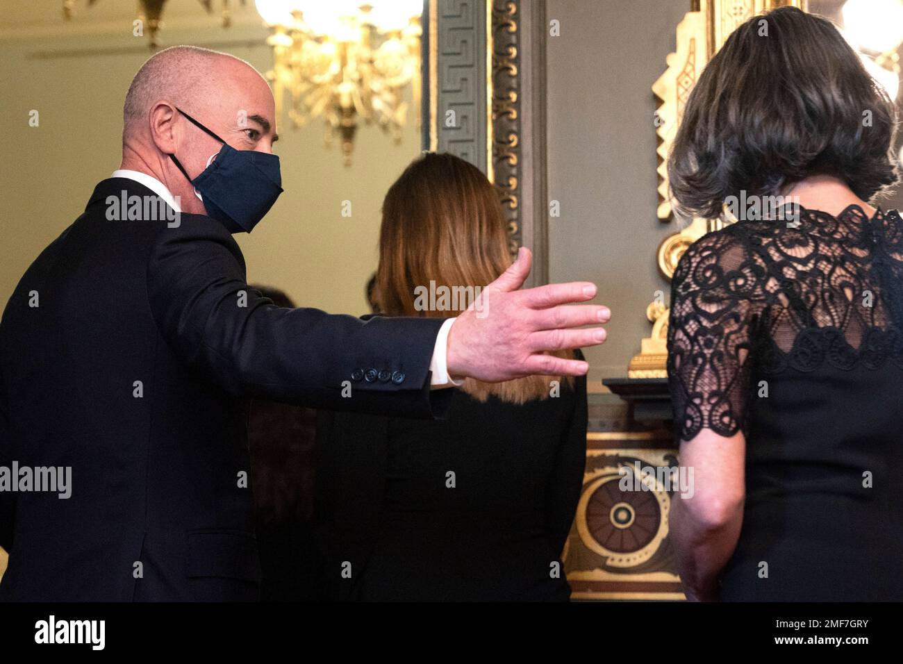 Alejandro Mayorkas turns to his wife, Tanya Mayorkas, after being sworn ...
