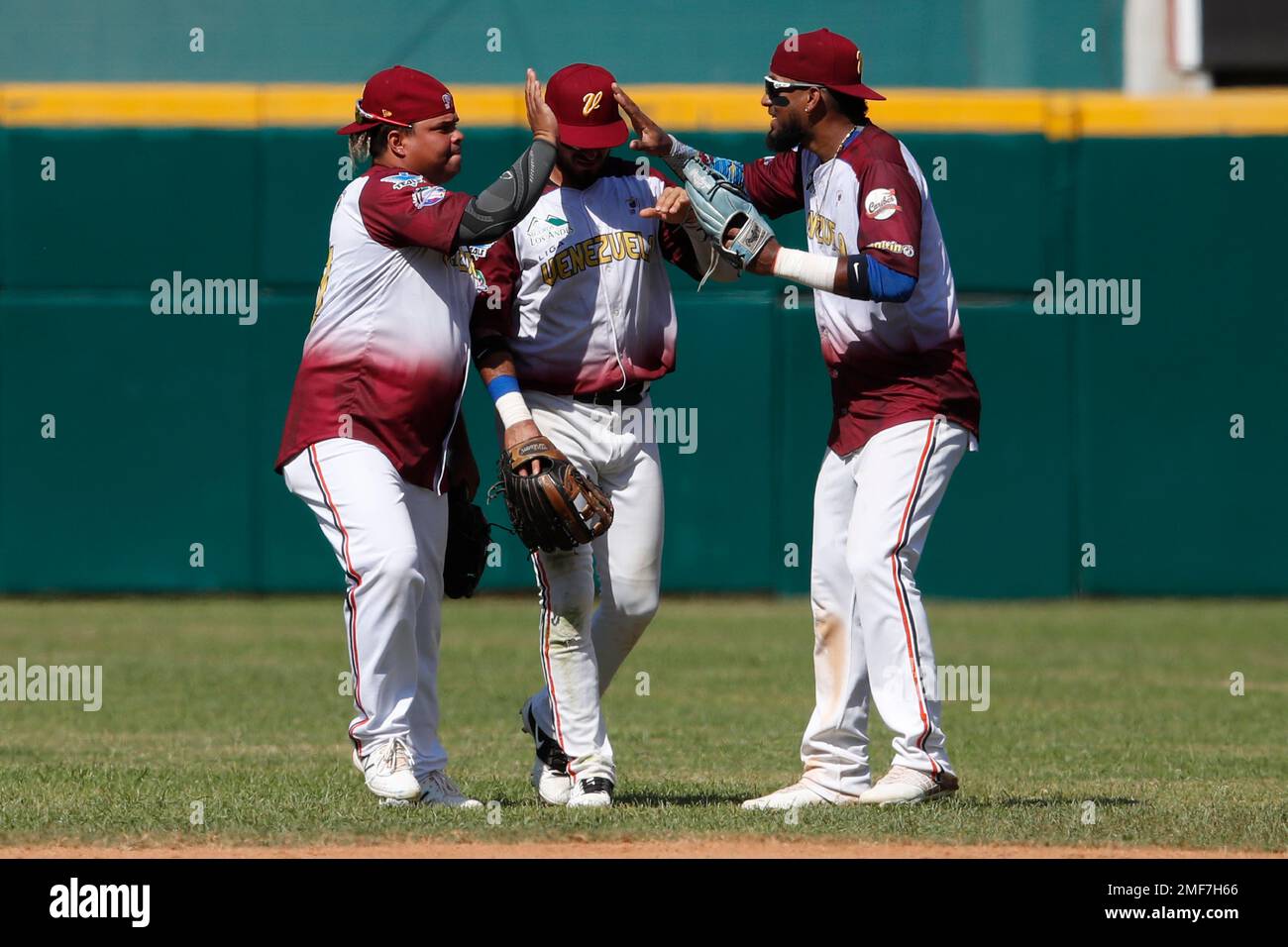 Venezuela's players celebrate after defeating Colombia 1-0, at the end ...