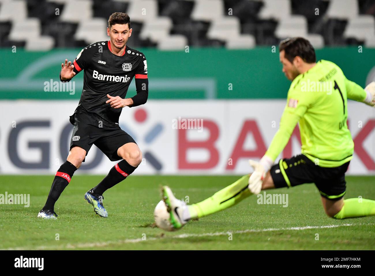 Essen's goalkeeper Daniel Davari saves a shot by Leverkusen's Lucas ...