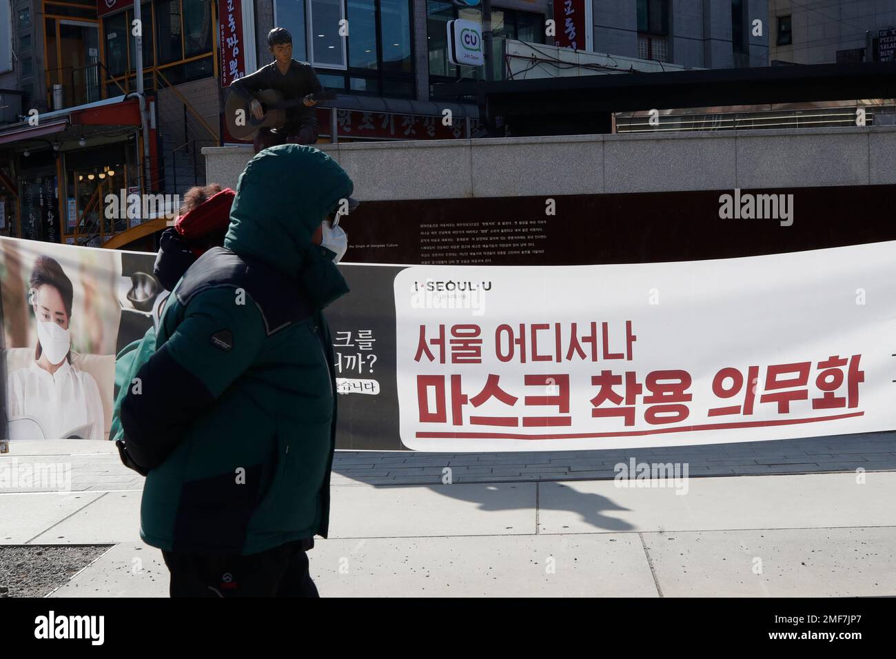 Visitors wearing face masks as a precaution against the coronavirus ...
