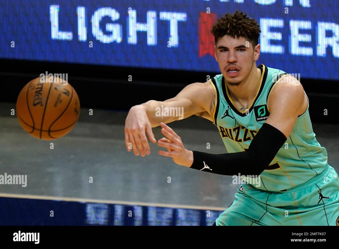 Charlotte Hornets guard LaMelo Ball passes the ball during the first ...