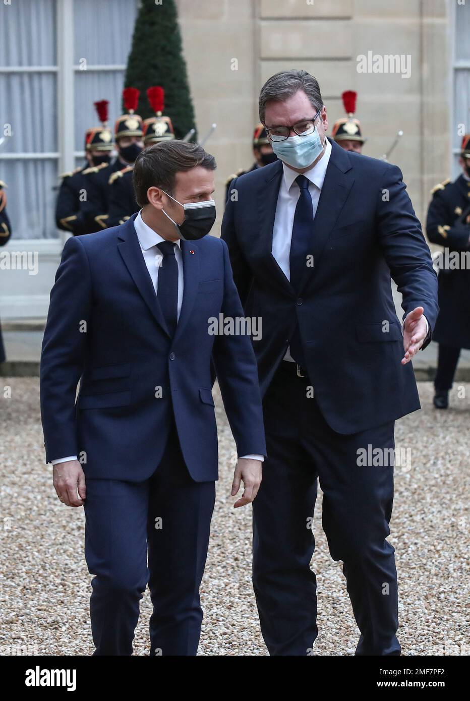 French President Emmanuel Macron, left, welcomes Serbian President ...
