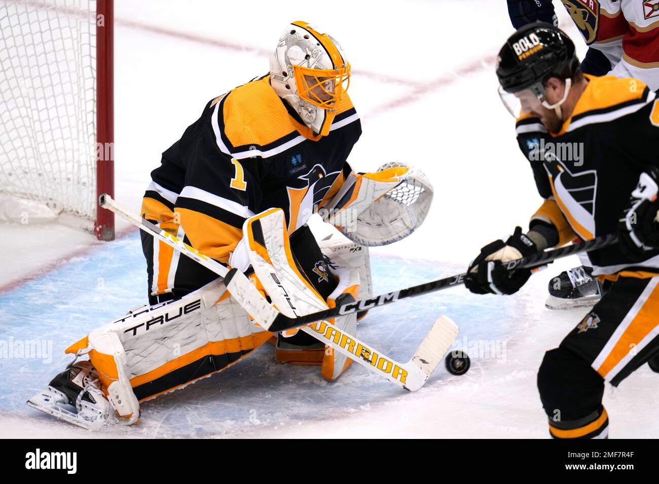 Pittsburgh Penguins goaltender Casey DeSmith (1) stops a shot during ...