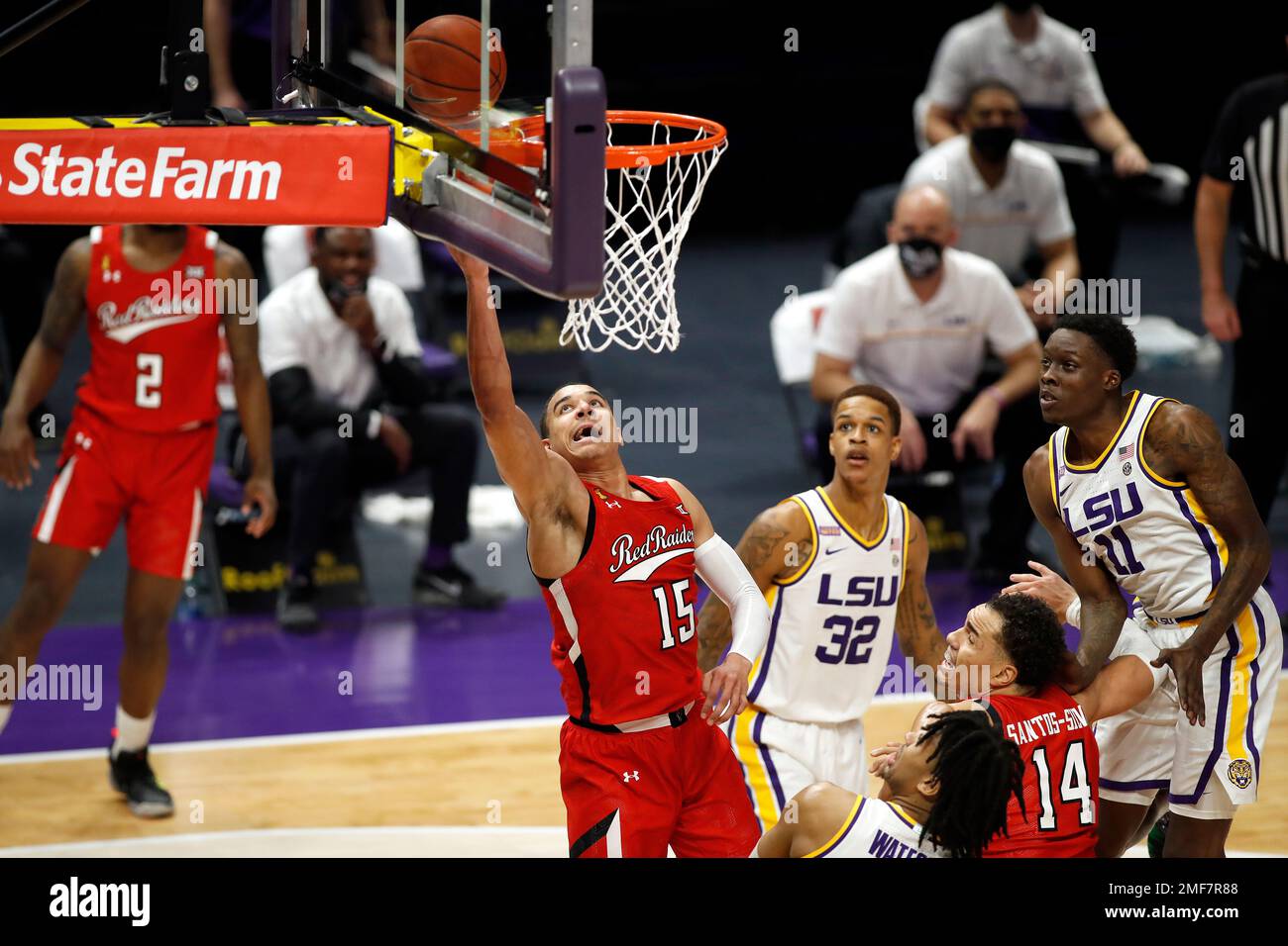 Texas Tech guard Kevin McCullar (15) and LSU forward Shareef O'Neal (32 ...