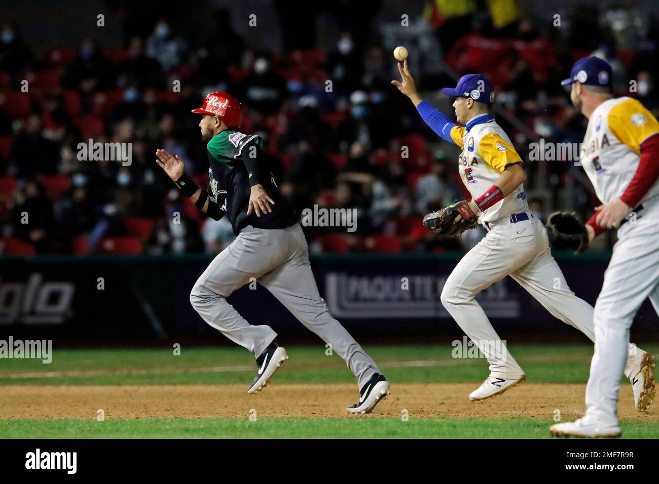 Colombia's Evan Mendoza, second from left, chases Mexico's Jesse ...