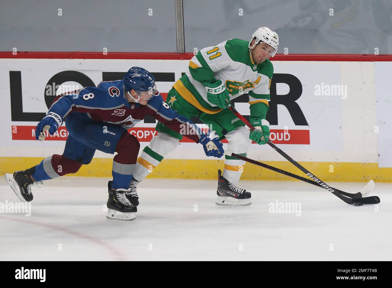 Minnesota Wild's Zach Parise (11) handles the puck against Colorado's ...
