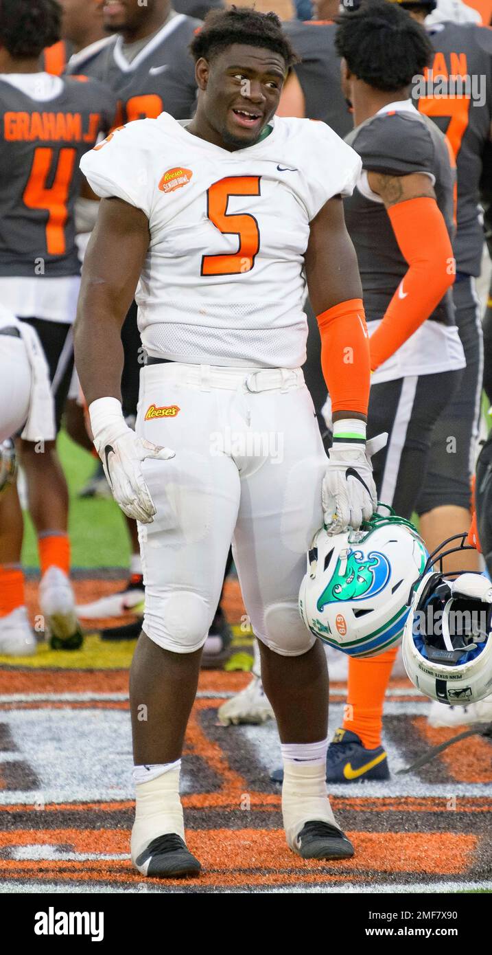 American Team defensive lineman Cameron Sample of Tulane (5) walks on ...
