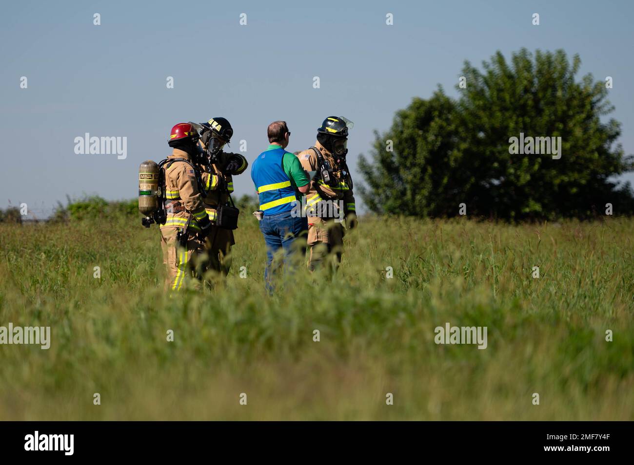 Members of Scott Air Force Base investigate the surrounding area during ...