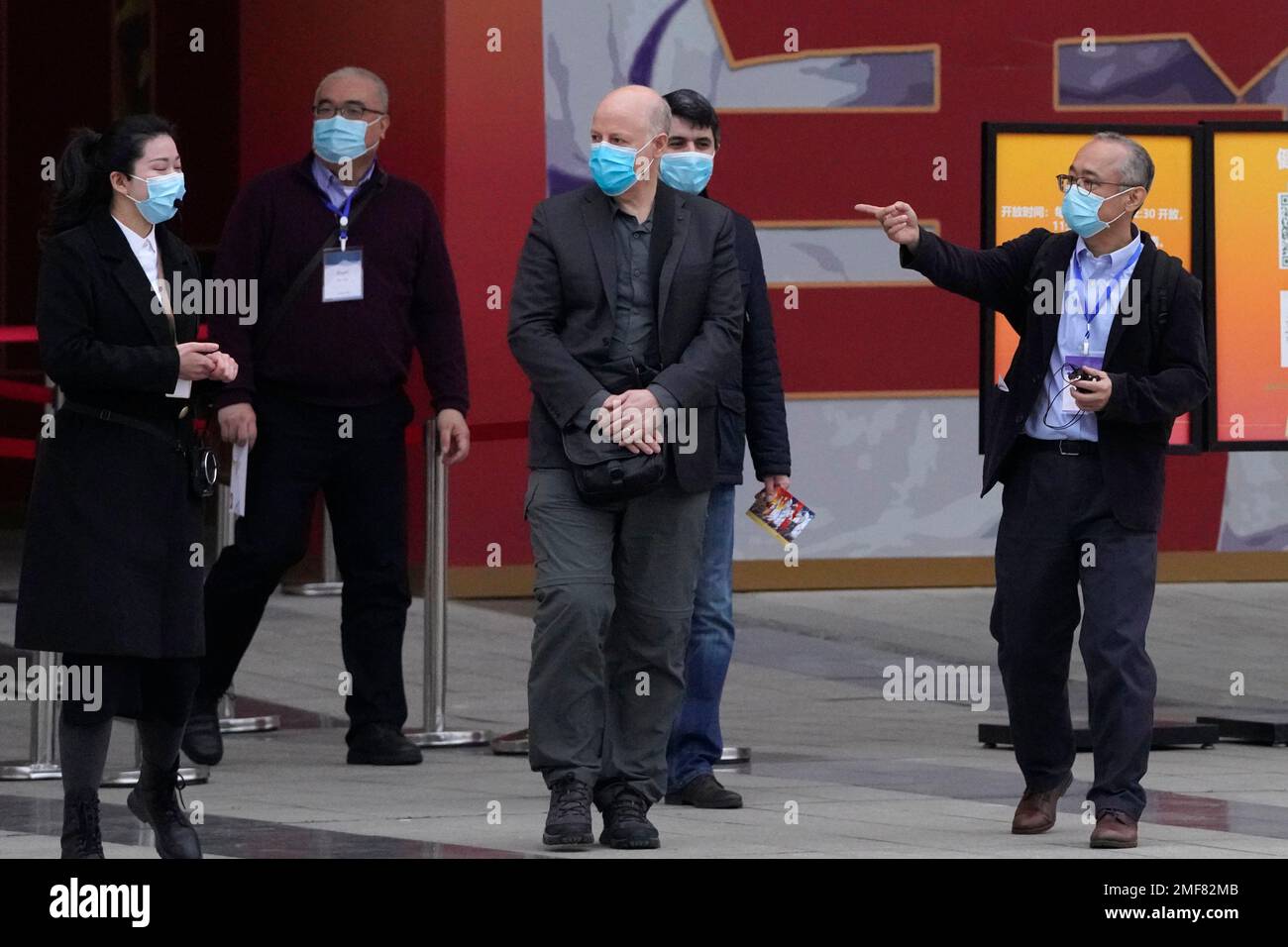 Members of the World Health Organization team including Ken Maeda right ...