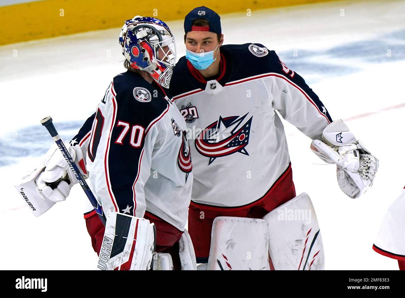 Columbus Blue Jackets goalie Joonas Korpisalo, left, celebrates with ... Columbus Blue Jackets goalie Joonas Korpisalo, left, celebrates with ...