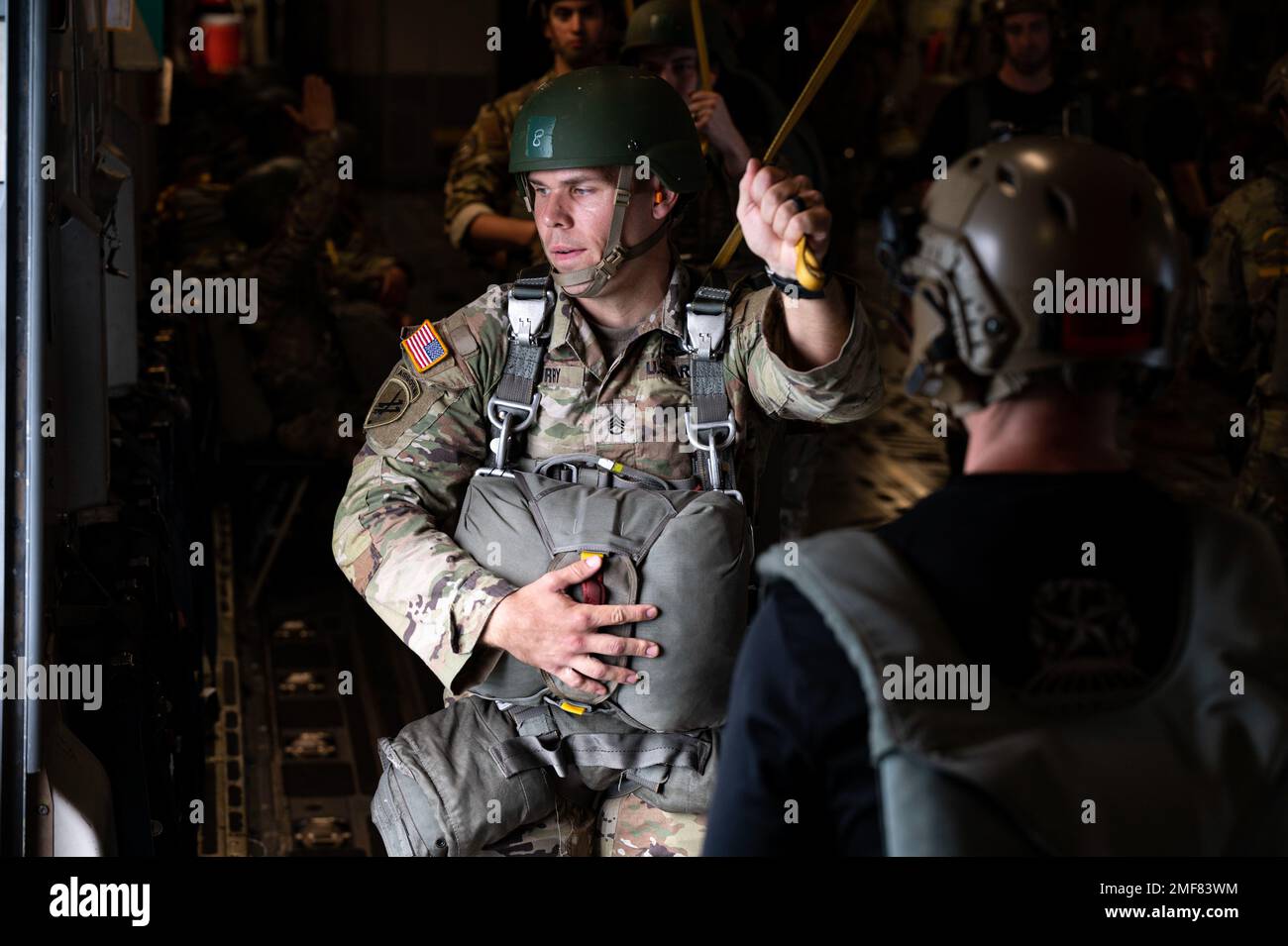 A member of Jumpmaster School Class 007-22 prepares to conduct their ...