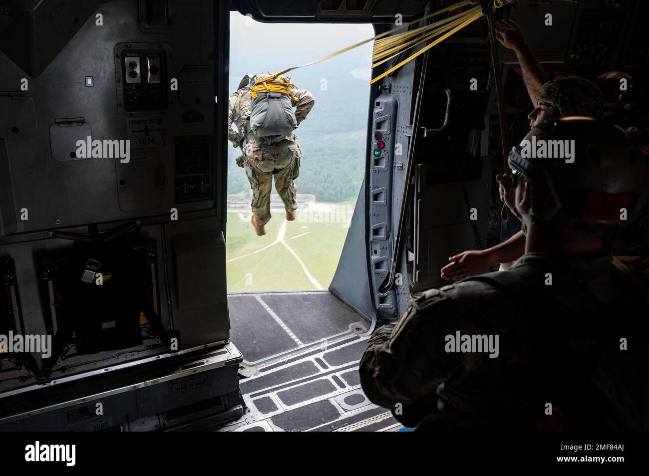 Members of Jumpmaster School Class 007-22 static line jump out a U.S ...