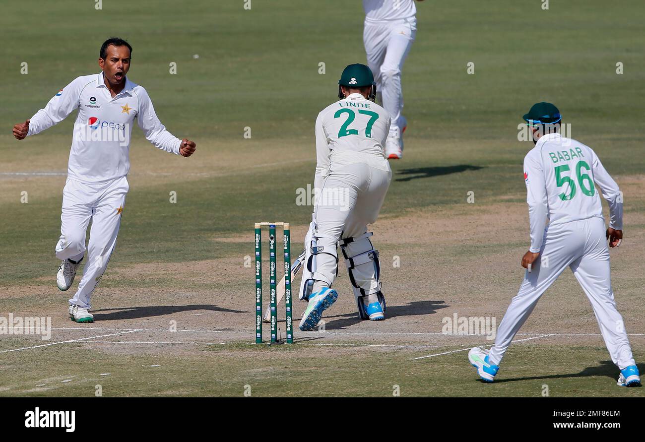 Pakistan's spinner Nauman Ali, left, celebrates after taking the wicket ...