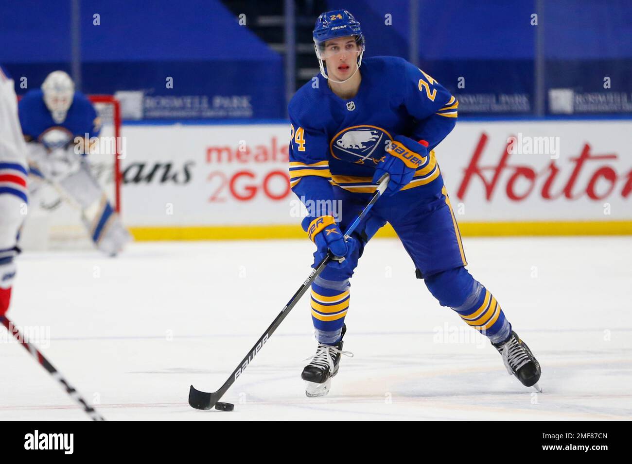 Buffalo Sabres forward Dylan Cozens (24) carries the puck during the ...