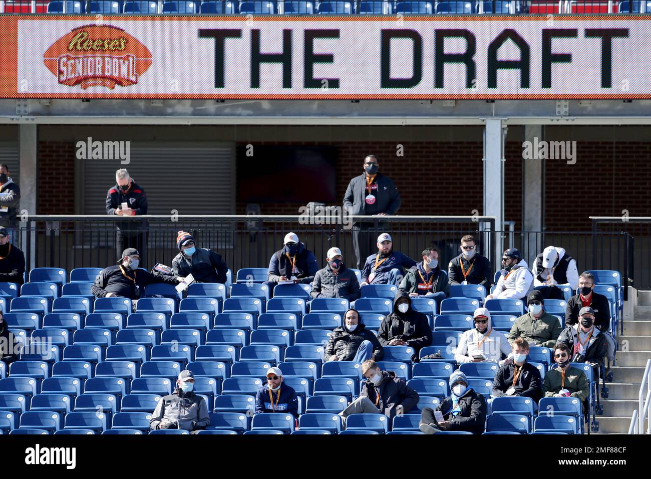 NFL team personnel watch the National team practice for the NCAA ...