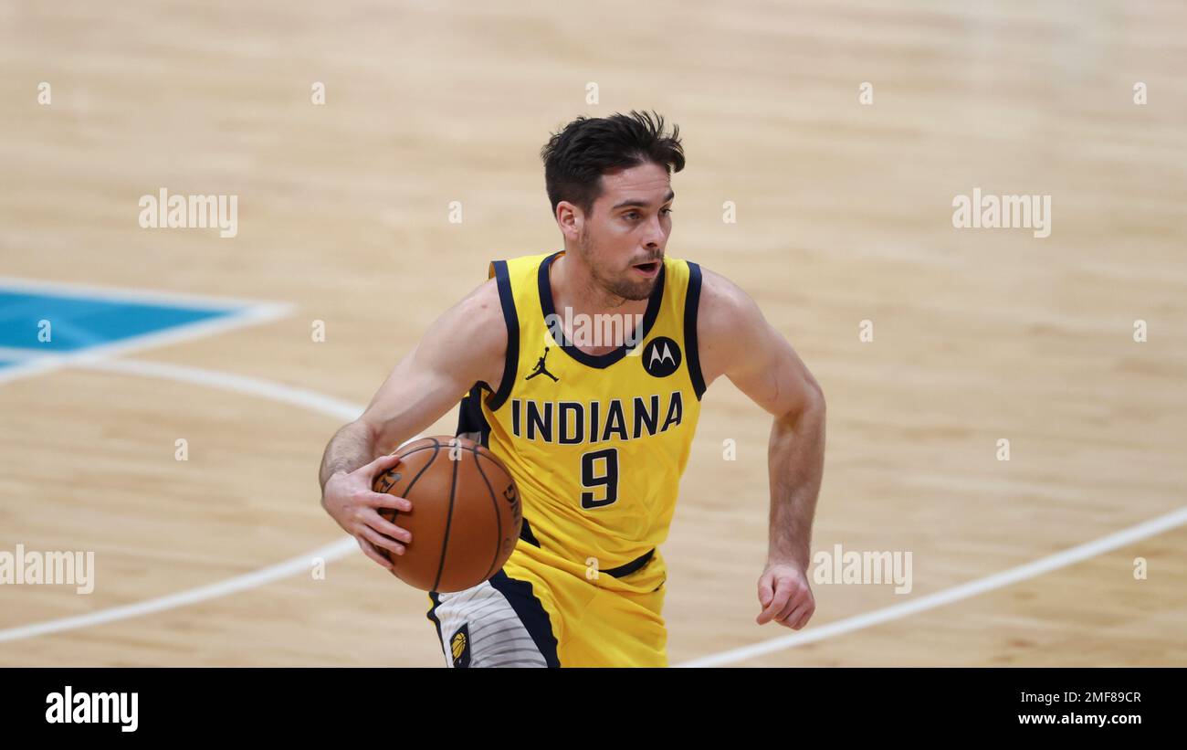Indiana Pacers guard T.J. McConnell brings the ball up court against ...