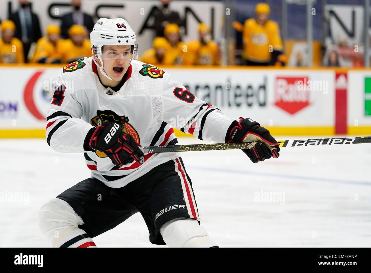 Chicago Blackhawks center David Kampf (64) plays against the Nashville ...