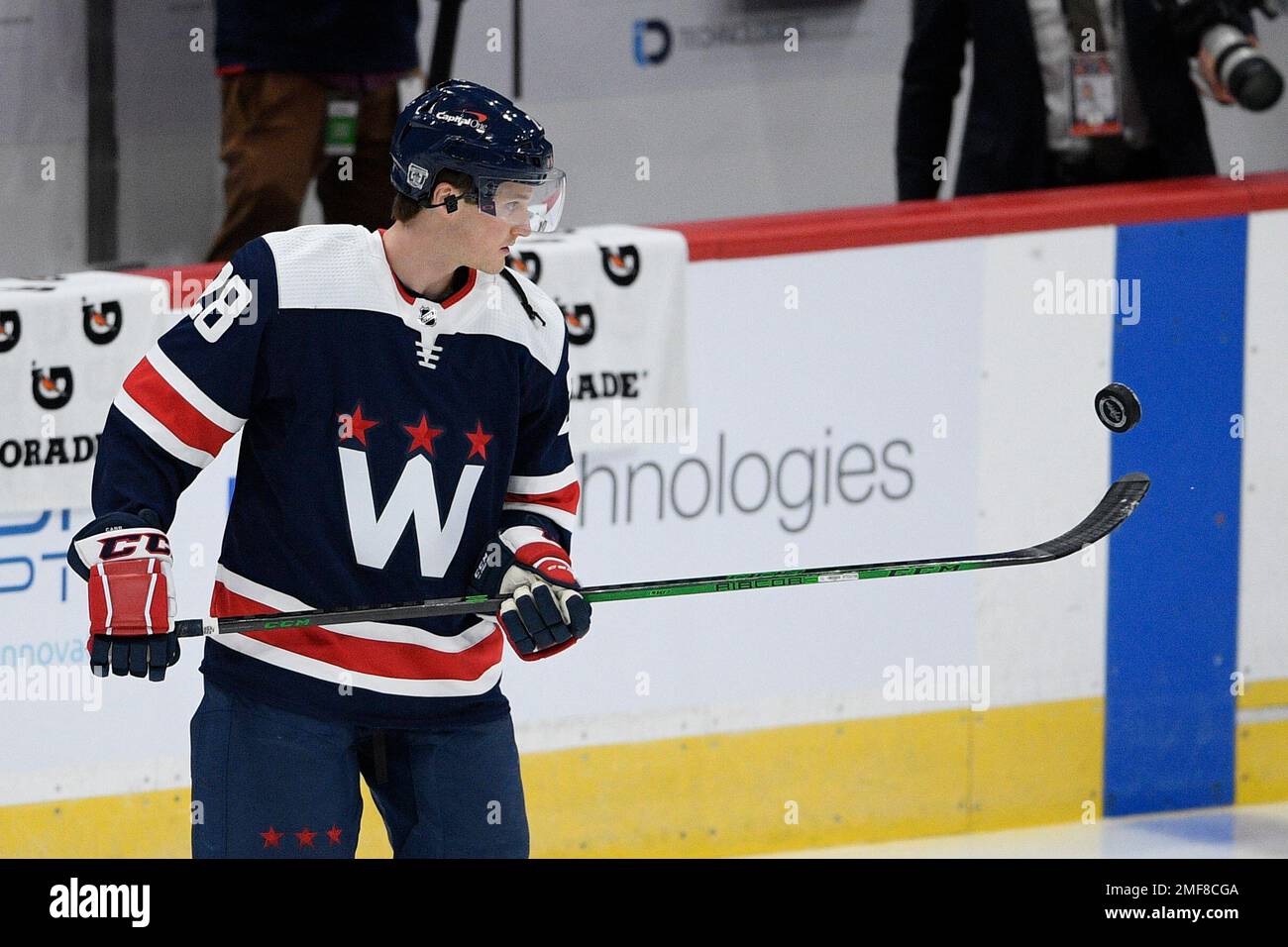 Washington Capitals left wing Daniel Carr warms up before an NHL hockey ...